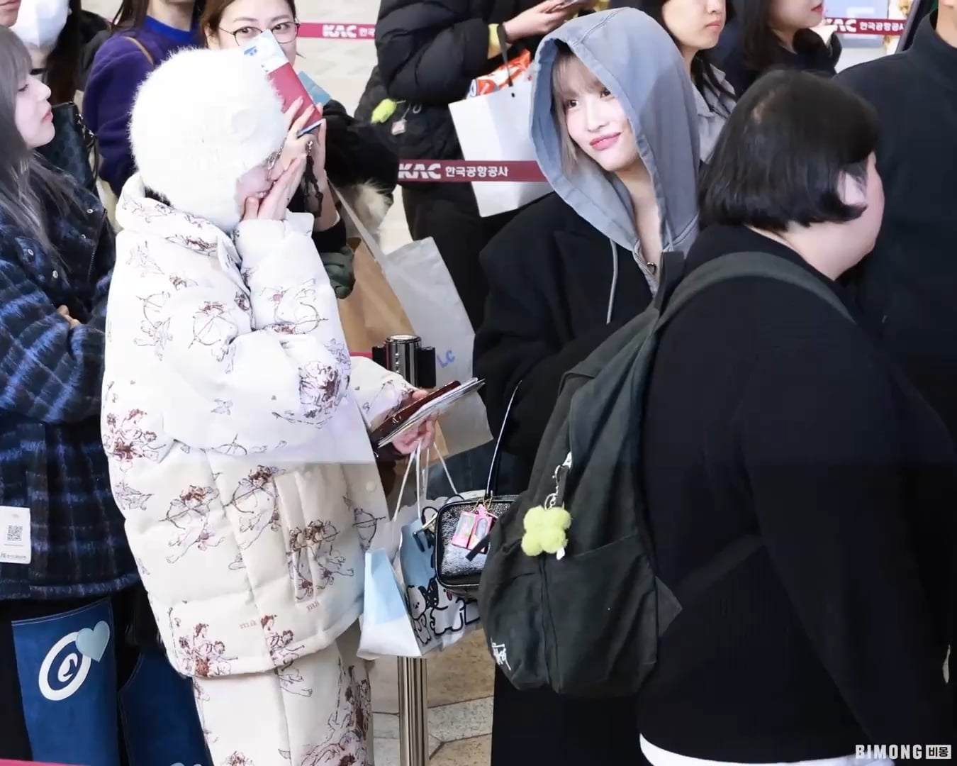 Momo laughing so much we can see her nose scrunches from that far - MAGMOE